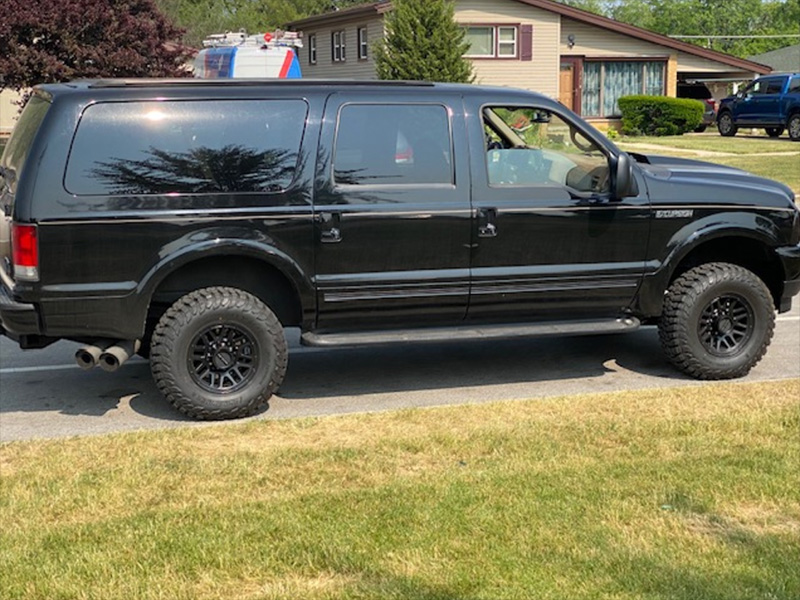 2001 Ford Excursion - 16x8 Raceline Wheels 285/75R16 Land Spider Tires