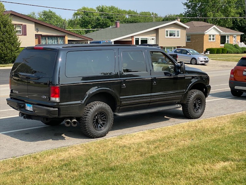2001 Ford Excursion - 16x8 Raceline Wheels 285/75R16 Land Spider Tires