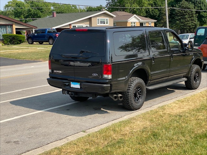 2001 Ford Excursion - 16x8 Raceline Wheels 285/75R16 Land Spider Tires