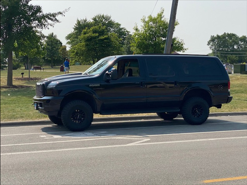 2001 Ford Excursion - 16x8 Raceline Wheels 285/75R16 Land Spider Tires
