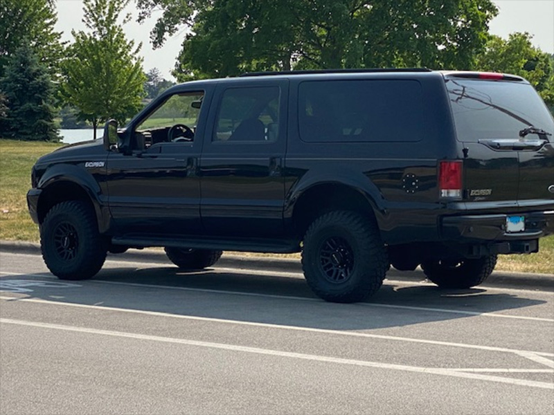 2001 Ford Excursion - 16x8 Raceline Wheels 285/75R16 Land Spider Tires